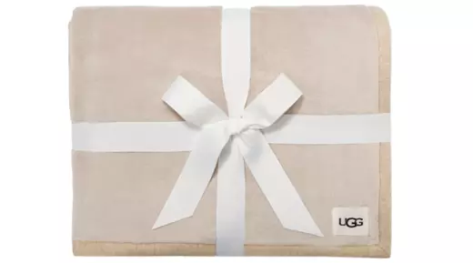 UGG Duffield Throw II ជាពណ៌ក្រែមជាមួយនឹងធ្នូពណ៌ស